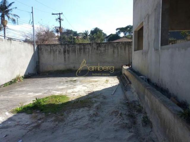 Terreno residencial plano 600m2 com construção inacabada em área nobre interlagos