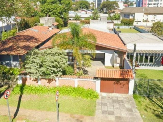 Terreno ZR 4 com Casa de alvenaria ALTO POTENCIAL CONSTRUTIVO – Bacacheri – Curitiba