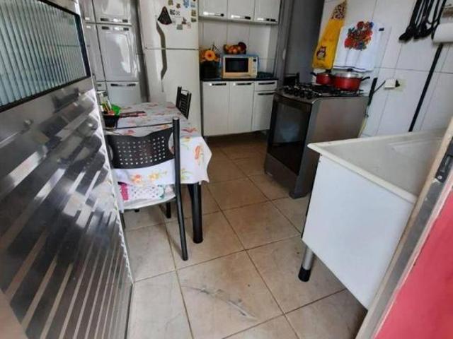 Terreno 10x25m com 2 casas e 2 salões e quintal amplo
