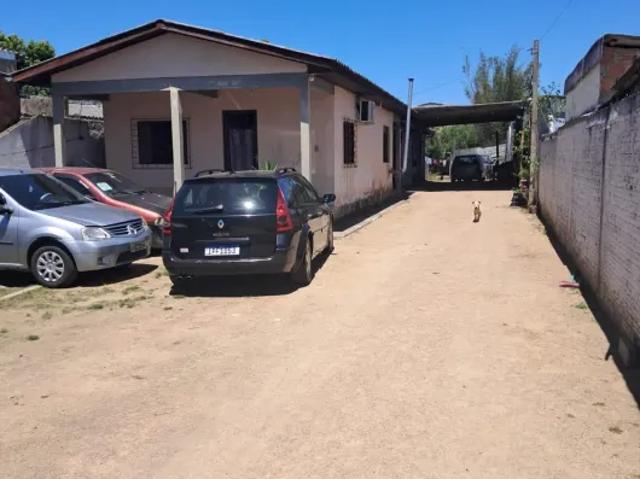 Terreno 11x160 com 2 casas