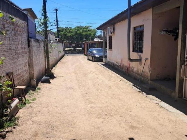 Terreno 11x160 com 2 casas
