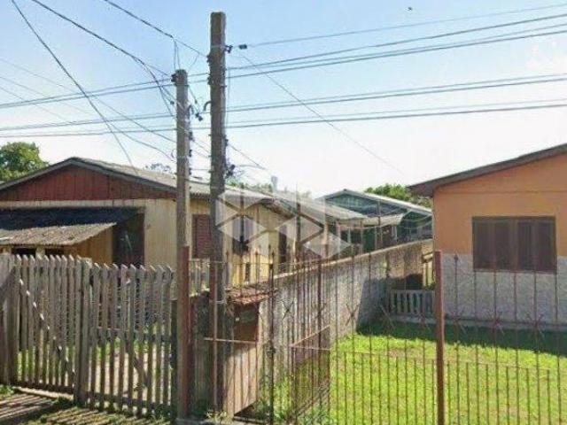 Terreno 11x40m 440m² com 3 casas de madeira no bairro Harmonia Canoas