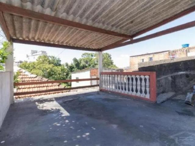 Terreno 235 M2 com casa construída de 75m2