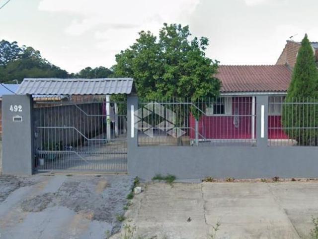Terreno 308m² com casa de 2 dormitórios e piscina em Esteio