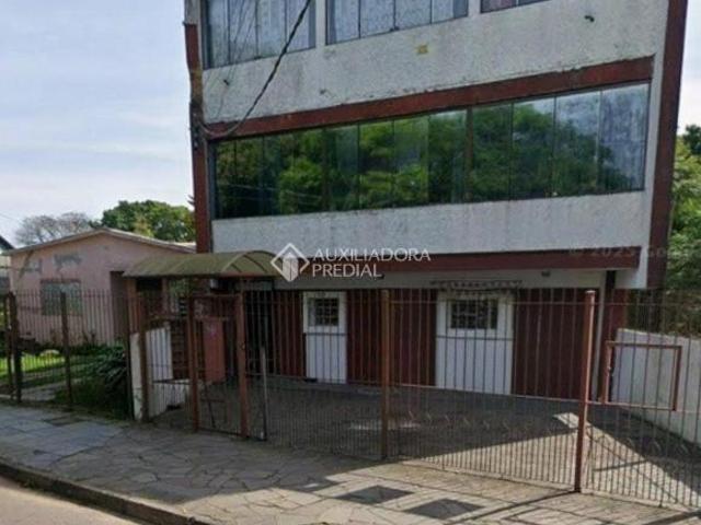 Terreno 600m² no Camaquã com prédio residencial de 4 apartamentos