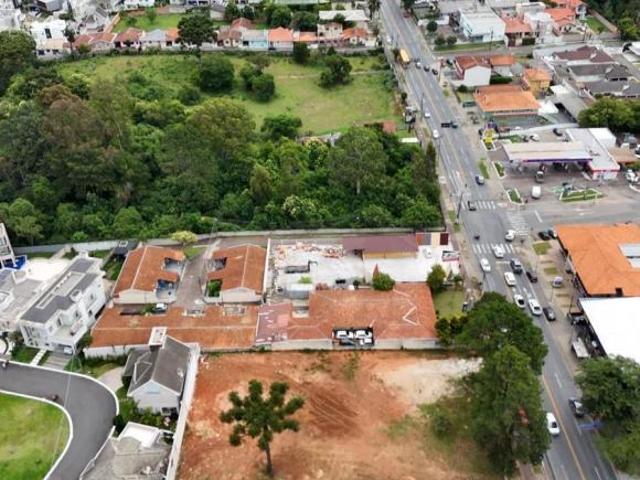 Terreno/Área com 1.200,00m² em SANTA FELICIDADE com 02 casas comerciais e 08 residenciais