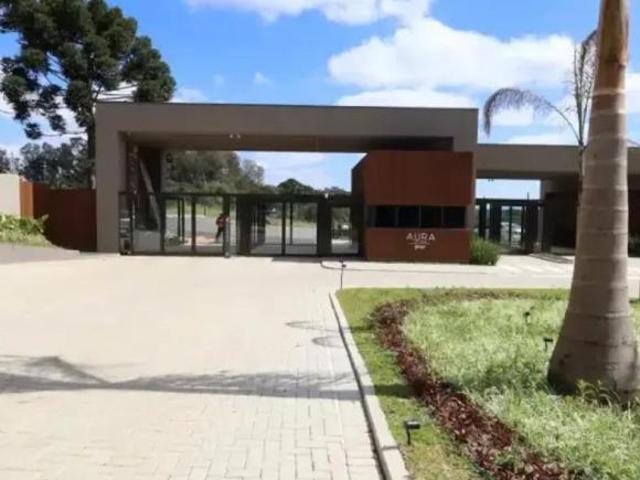 Terreno/Área em condominio no BUTIATUVINHA com 767m²