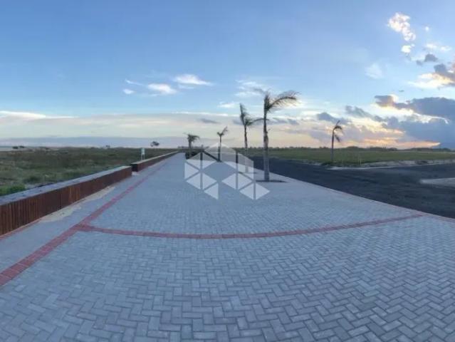 Terreno/lote de 489 m² de esquina, no loteamento esmeralda na praia do arroio do sal rio grande do