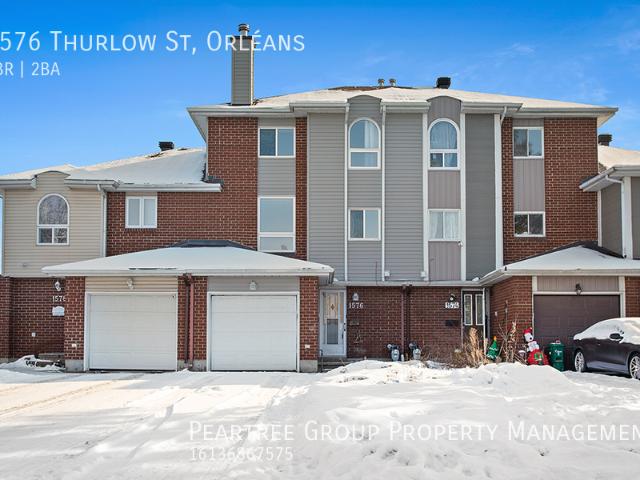 Renovated 3 Bed + Den Townhouse with Finished Basement & Backyard