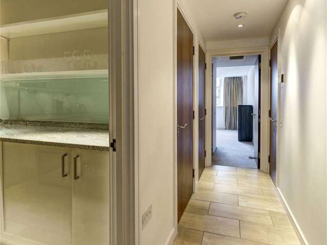 The apartment block benefits from two private outside areas