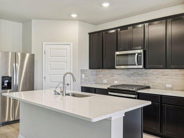 The Briscoe 820 Plan Turner's Crossing Reserve Collection Community