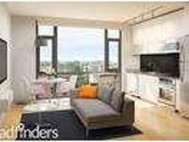 The Shay #1 Bedroom, 1 Bath 590 SF 11C: Washing.