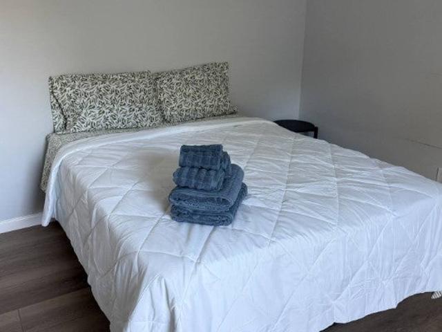 The private bedroom offers a queen