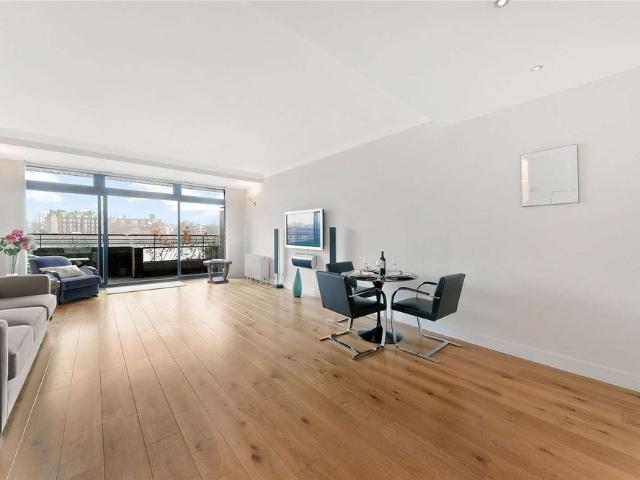 The property is located just off Battersea Bridge with direct views of the river with the added benefit of two large balconies