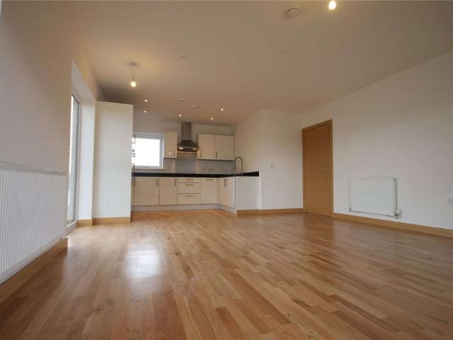Third floor one bedroom apartment with balcony and parking