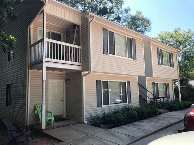 This newly renovated quadraplex is located eight minutes from Uptown Charlotte.