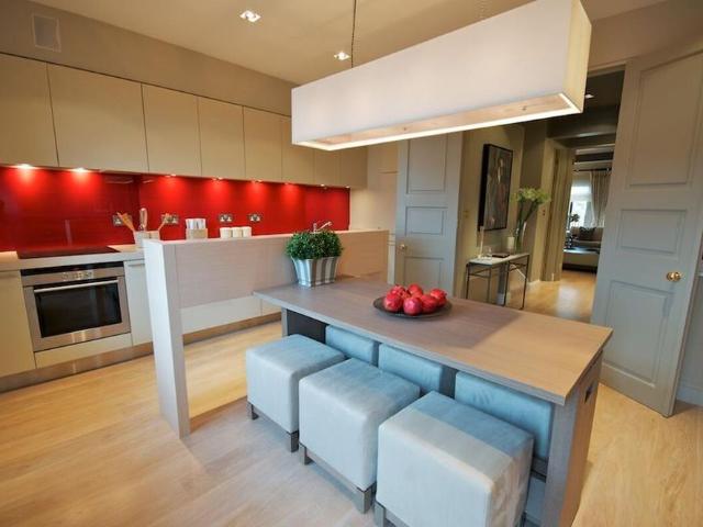 This beautifully arranged duplex apartment is set across the fourth and fifth floors of a prestigious building on Cadogan Square