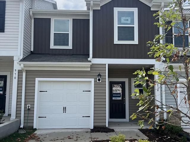 This beautifully designed townhome is ready for you to move in and enjoy a truly maintenance free lifestyle. The kitchen is equipped with a spacious island and a stainless steel appliance package, including a gas stove and installed refrigerator.