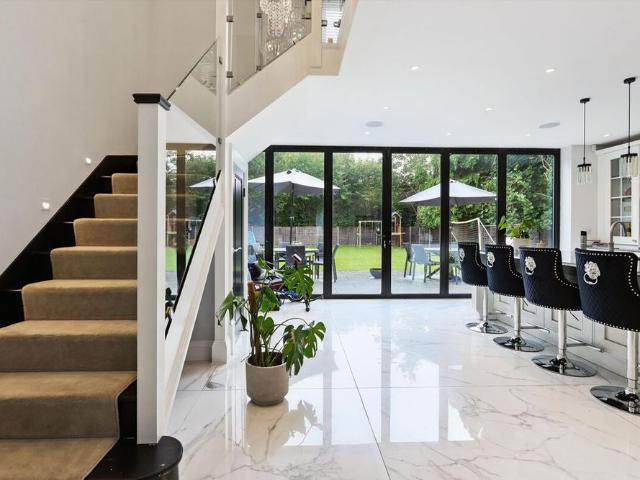 This exceptional property blends modern, high end finishes, and secure gated living to create a truly move in ready family home