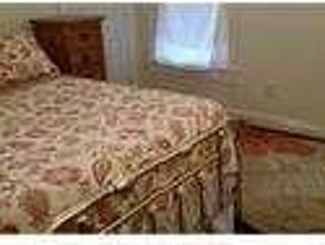 This house is updated with granite countertop and marble backspash
