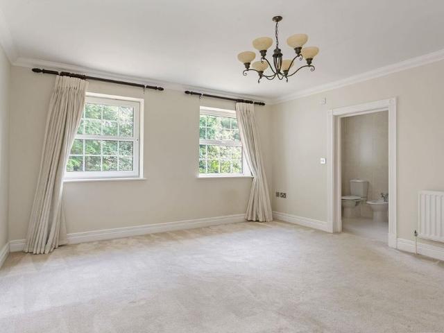 This spacious family home is set over four floors and is set behind gates