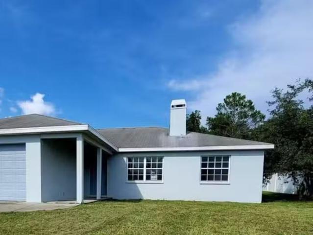 This spacious 3 bedroom, 2 bath, 2 car garage home 4716 Elwoo.