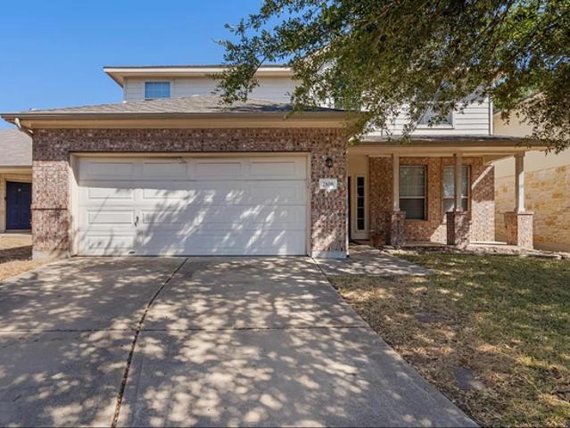 This spacious 4 bedroom, 2.5 bathroom home offers over 2,280 square feet of comfortable living space in the quiet and desirable Crossing at Onion Creek neighborhood.