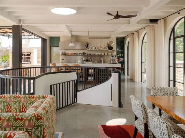 This truly exceptional penthouse apartment occupies the top floors of an impressive redevelopment of a former bookbinding workshop, perfectly positioned on the highly sought after Barnsbury