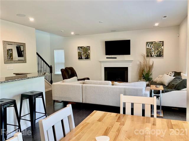 This 3 bedroom 2.5 bath home has an open floor plan and upgraded features. Gas log fireplace in the family room and built in surround sound. Gourmet kitchen with 42 beautiful white cabinets, SS appliances and granite counter tops.