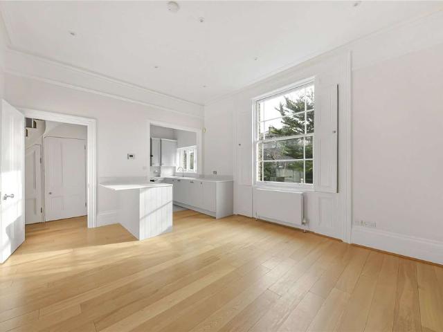 Three bedroom maisonette apartment with its own private entrance on a tree lined street