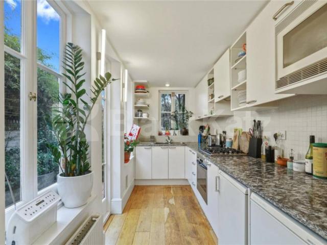 three bedroom split level home is located on the sought after College Terrace
