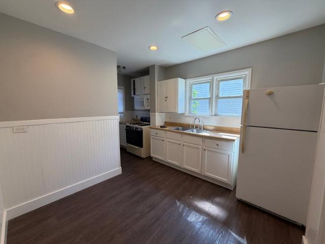 Title: 1 Bed 1 Bath Apartment with Attached Garag