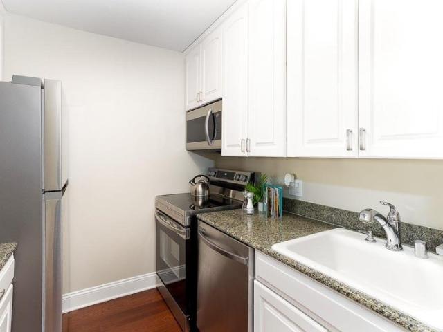 To this bright and spacious one‑BR condo in Santa