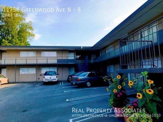 Top Floor One Bedroom Updated Apartment with a Private Deck and Assigned Parking