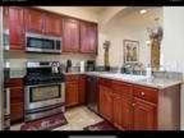 Top floor of townhouse, bedroom, living room, and private bath
