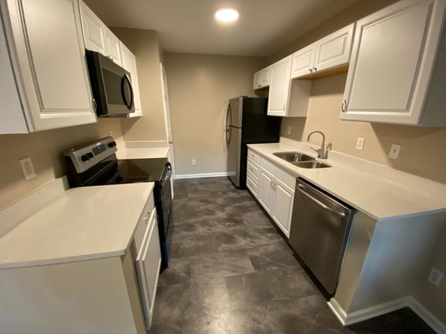 Townhome is ideal for roommate living. Features new kitchen with quartz counter and new bathrooms. 4 bedroom, 2.5 baths. Great location 1.5miles from downtown Raleigh on quiet Block. Close to Greenway and easy access to shopping via 440/I40