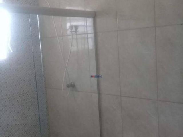 Três casas residenciais e um salão comercial em um terreno de 125,00ms2 Jardim Paraventi Guarulh