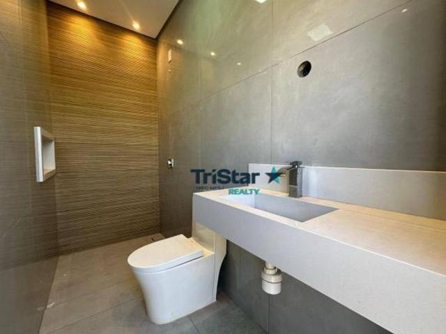TRISTAR REALTY CA0539 CASA TÉRREA COM 3 SUÍTES EM CONDOMINIO ALTO PADRÃO AT. 360m² AC. 207m²