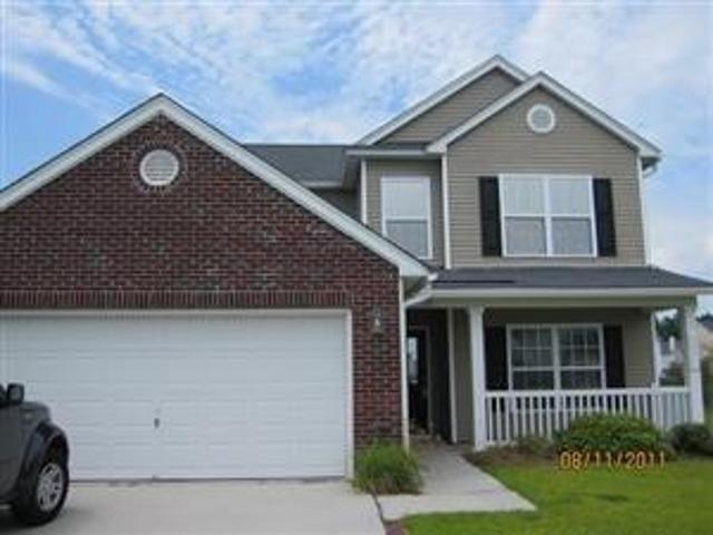 True 4 bedroom home with fenced in back yard!