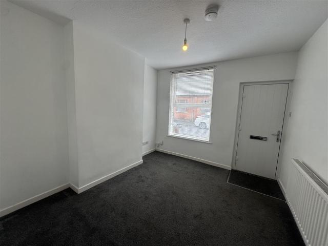 TWO BED TERRACE. This two bedroom mid terrace unfurnished house boasts of modern accommodation, making the perfect home for any couples or working professionals looking to be located in the popular location. This property is within close proximity to a r