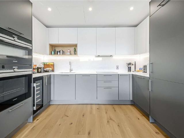 Two bedroom apartment with a balcony looking over the residents' private courtyard