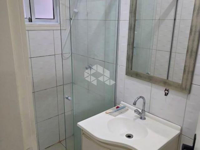 Um dormitório mobiliado no Centro de Capão da Canoa RS