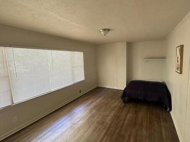 Updated & Cozy Atlanta Home | Furnished, Secure, and Spacious | No Move In Fee, Free Wi Fi, Monthly Cleanings, Bus Stop 0.2 Mile Away, and Grocery Store 0.3 Miles Away