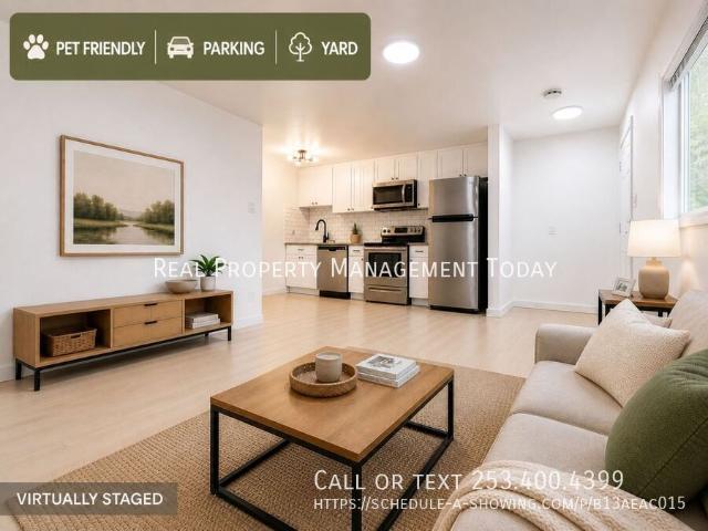 Updated Pet Friendly 1 Bedroom with Private Patio/Deck, Fenced Yard Access, Parking Directly Outside & Modern Finishes