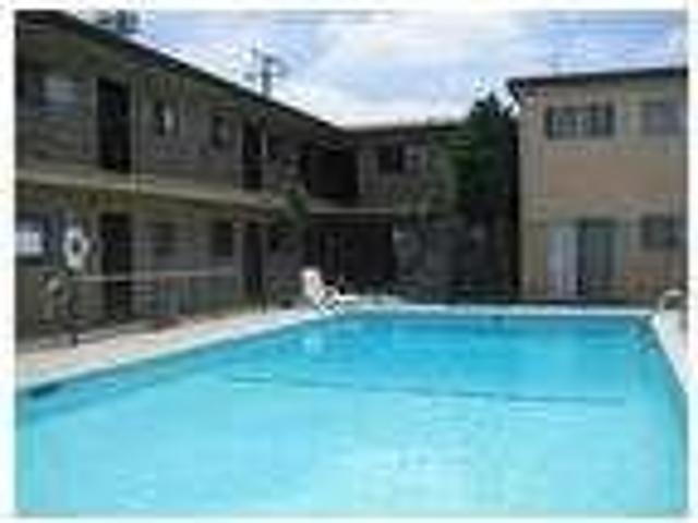 UPGRADED INTERIOR w Beautiful Plank Floors, Large Closets, Appliances