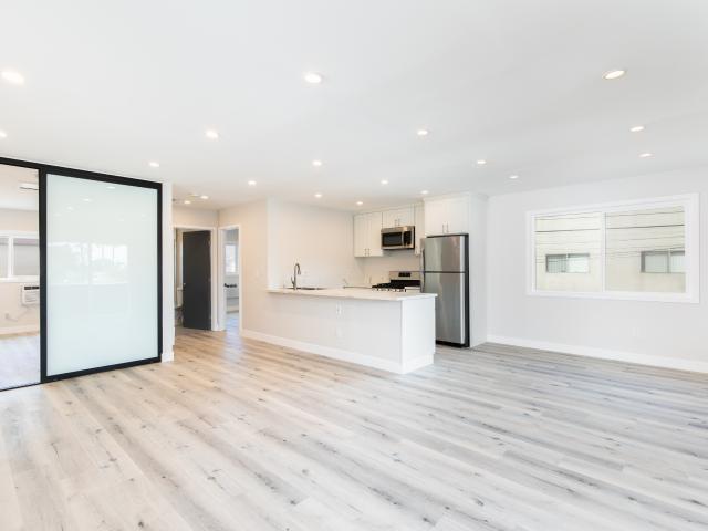 Upper 2BD/1BA Unit in Triplex |Beautifully Updated | Laundry On Site | 2 Car Parking Incl