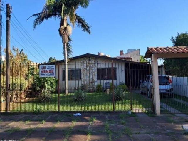 VENDA: Casa de 03 dormitórios com suíte, em rua elevada no bairro tamandaré