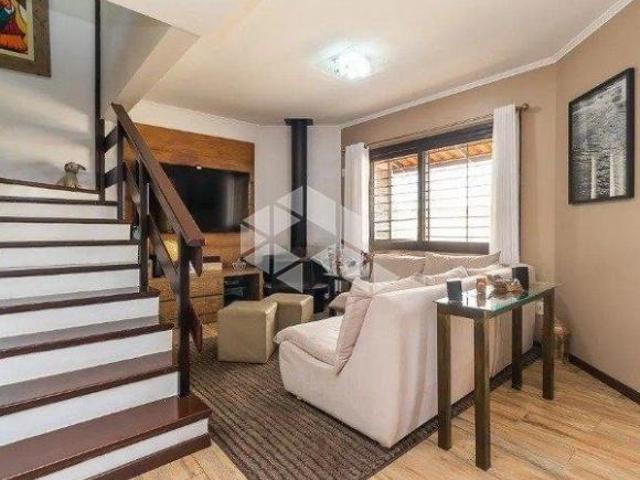 VENDA CASA EM CONDOMÍNIO DE 2 DORMITÓRIOS COM VAGA GARAGEM