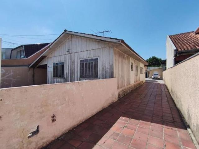 Venda de Terreno com 3 Casas – Excelente Oportunidade