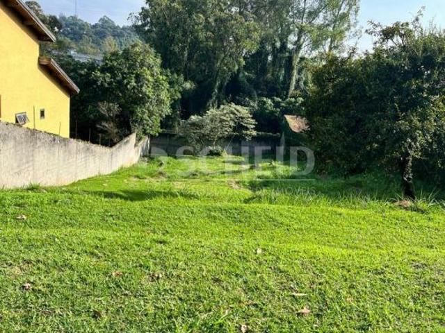 vende terreno em condomínio fechado tem 1025m declive médio na rua Platina JG 25B